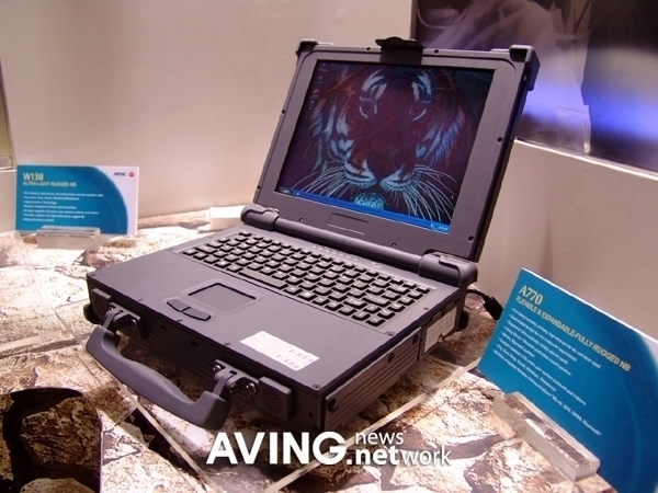 A robust notebook working in a pile of sawdust?