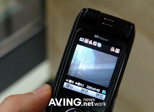 Curitel 1.3 mega pixel rotating camera phone with MP3P