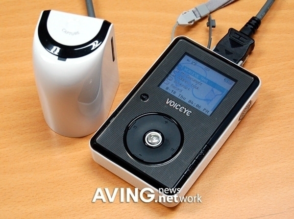 Portable text reader for the disabled